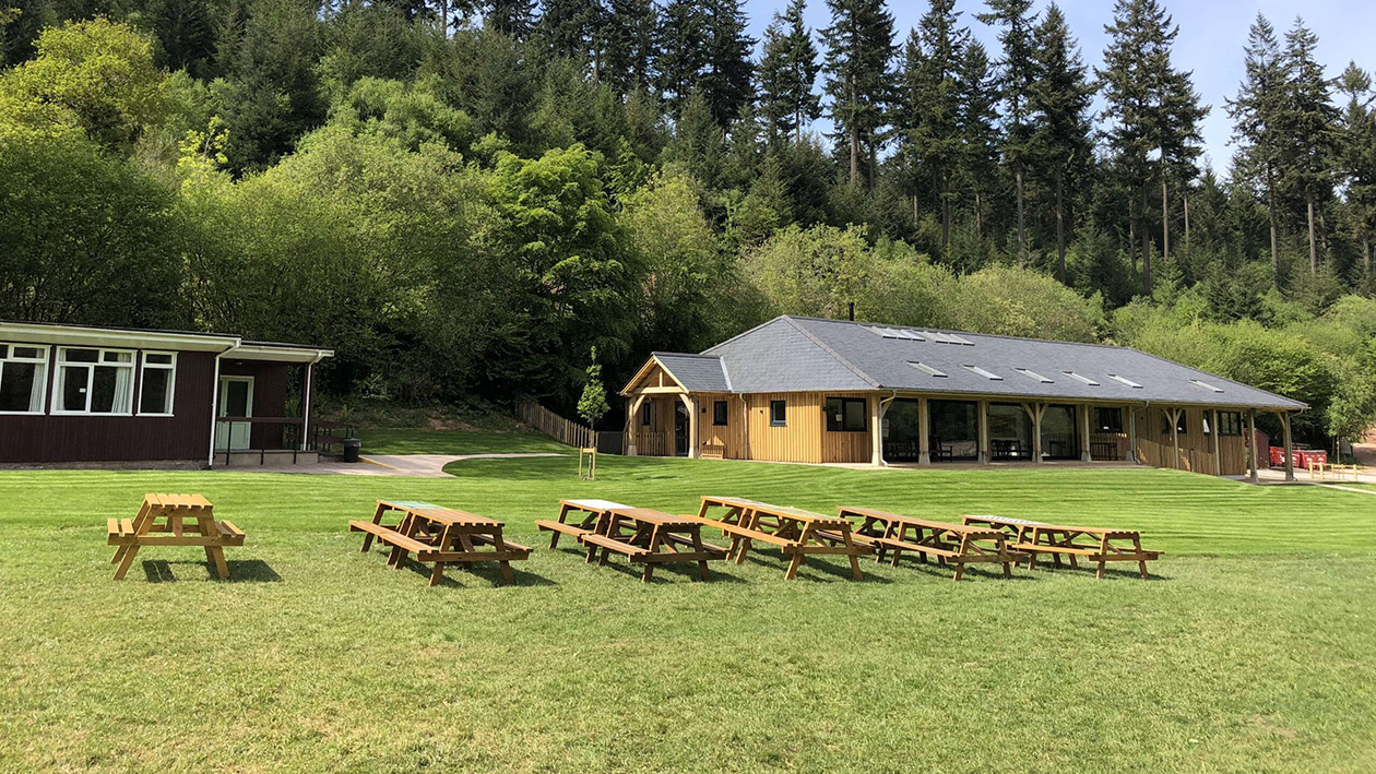 Crane lift roof panels Great Wood Camp Mess Hut, Over Stowey, Somerset