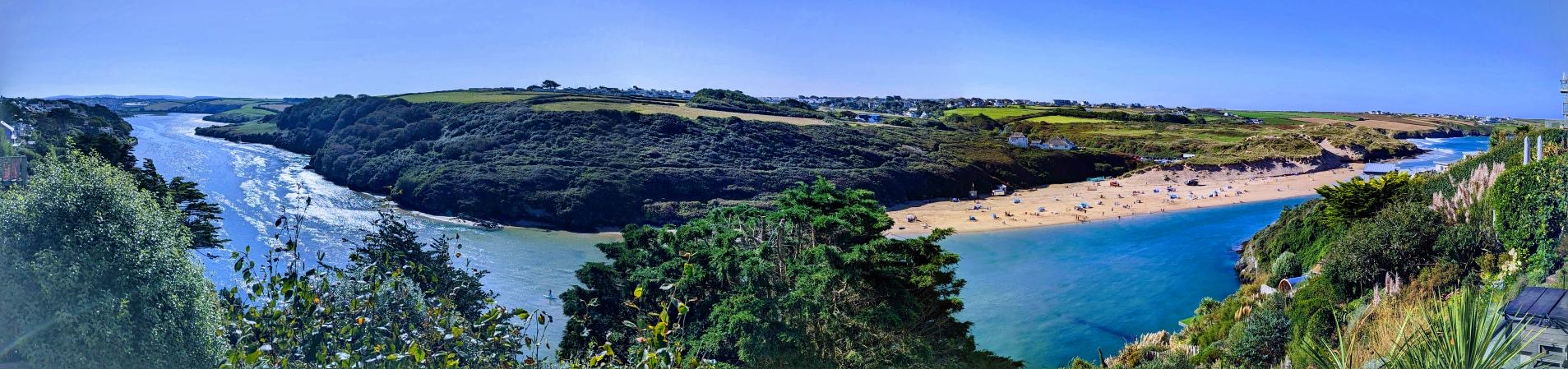 Crane lifting with picturesque views over the River Gannel in Newquay ...