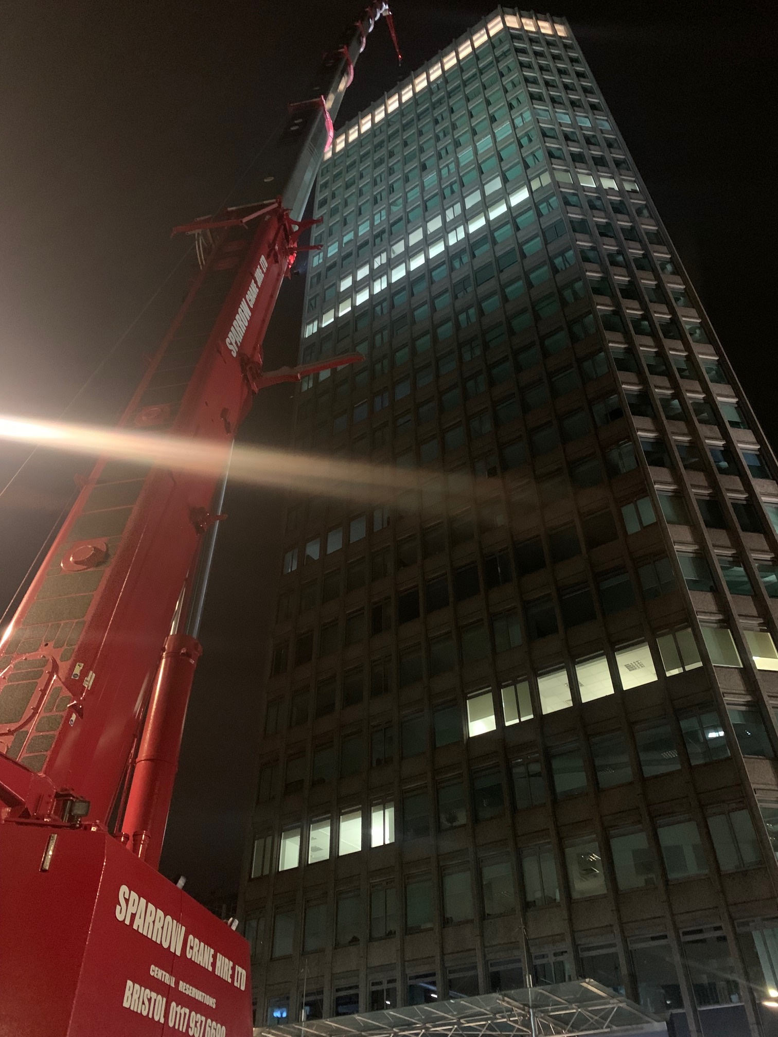 Liebherr LTM1300-6.3 lifting condensers onto Capital Tower's rooftop in ...