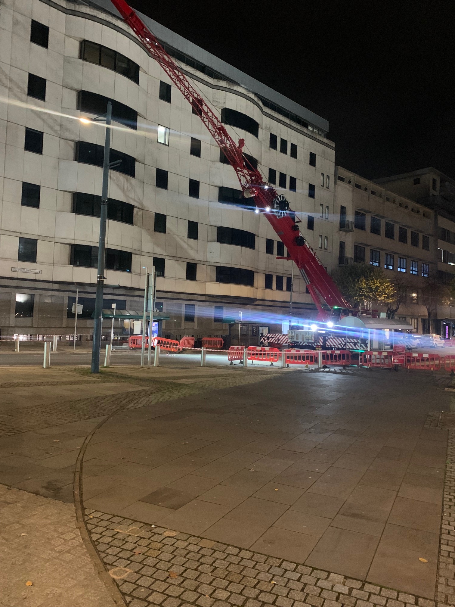 Liebherr LTM1300-6.3 lifting condensers onto Capital Tower's rooftop in ...