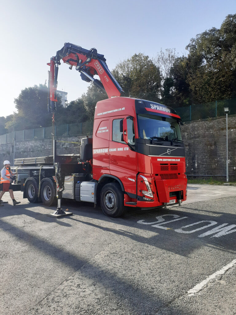 Our Fassi F710 Lorry loader Hiab placing steel aluminium Trakmats ...