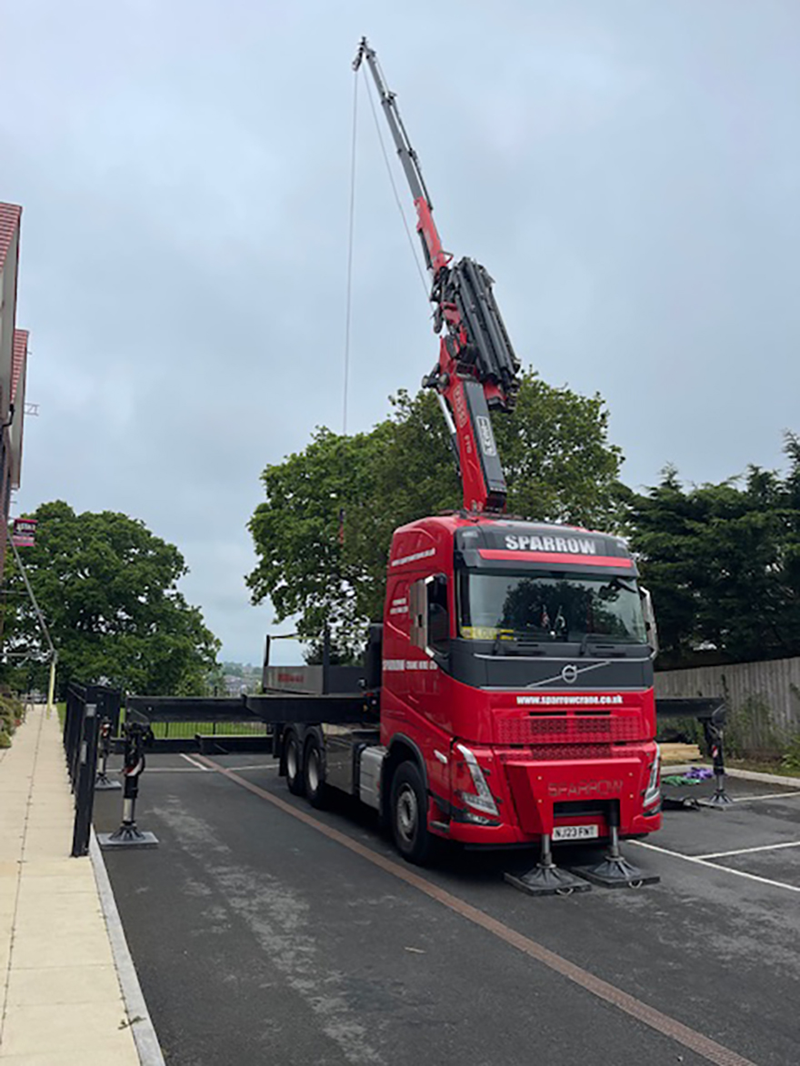 Our FASSI 710 Hiab Crane busy in the towns and cities through Devon ...